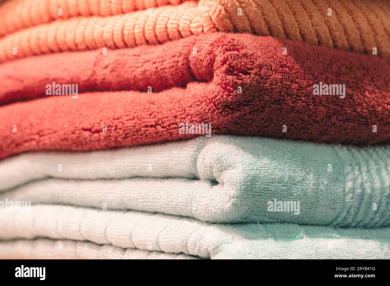 Colorful towels on store shelves Stock Photo - Alamy