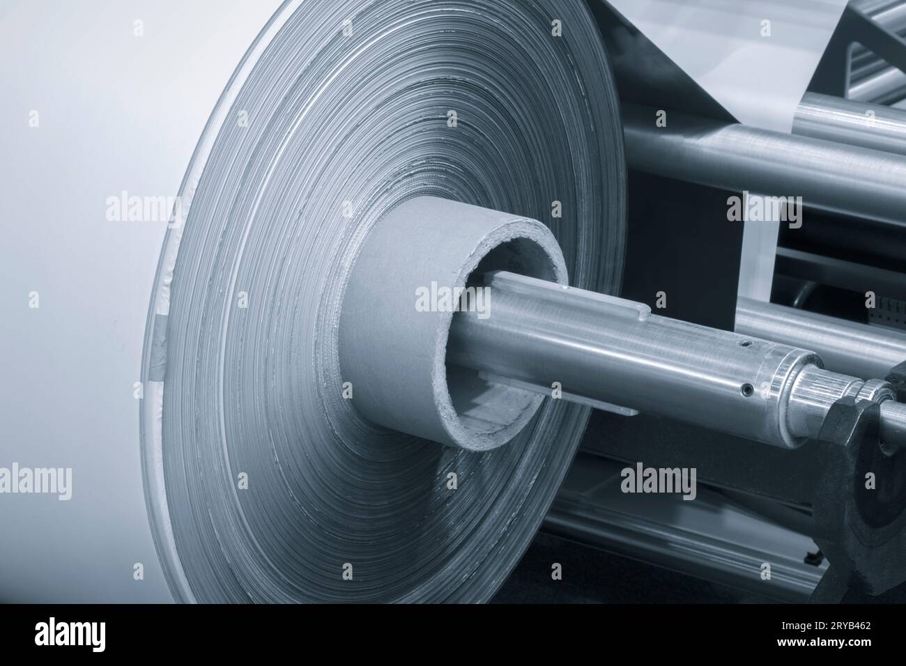 Rolls paper and fabric in wide industrial plotter Stock Photo - Alamy