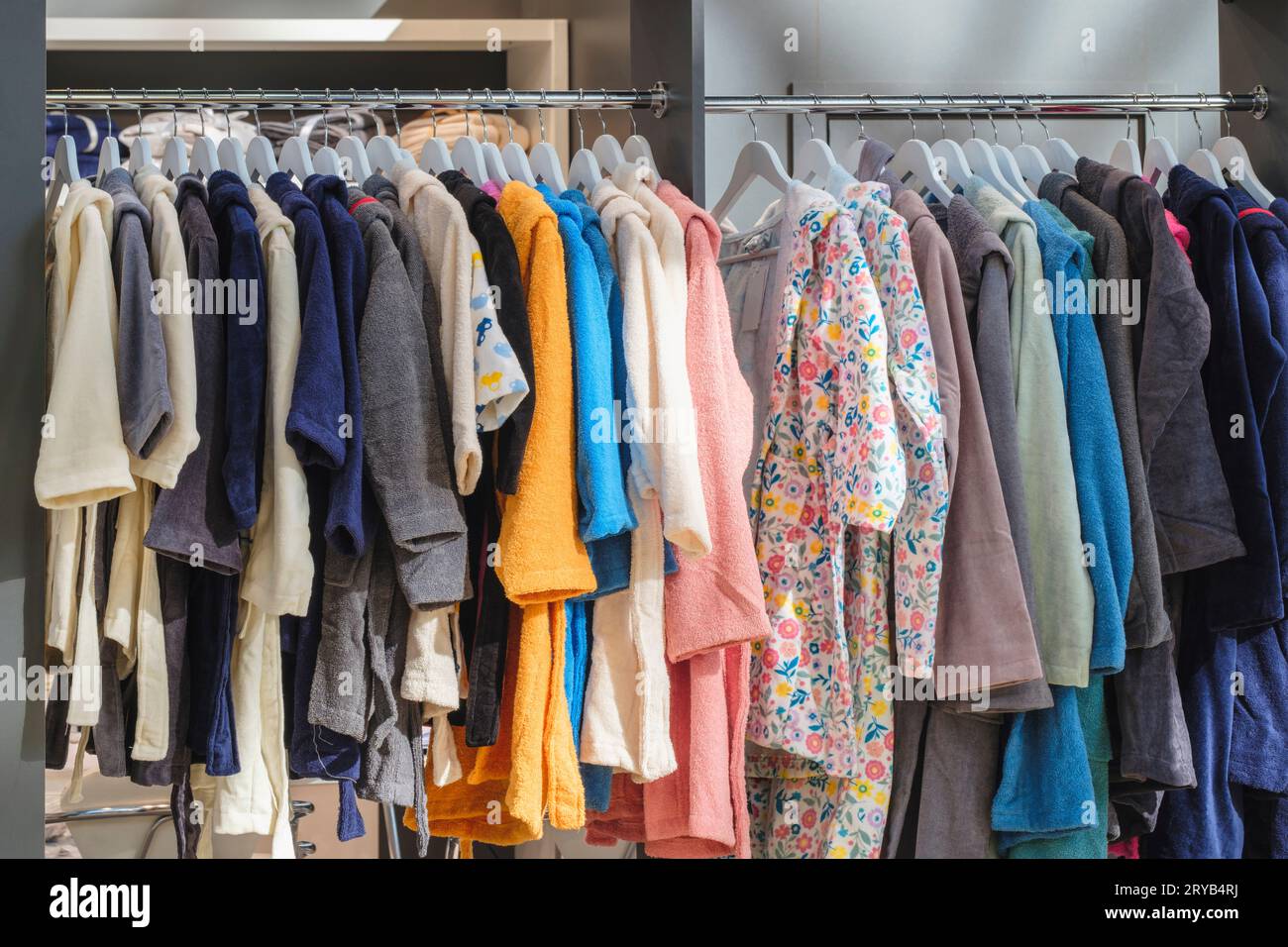Changing room yellow shirt hi-res stock photography and images - Alamy