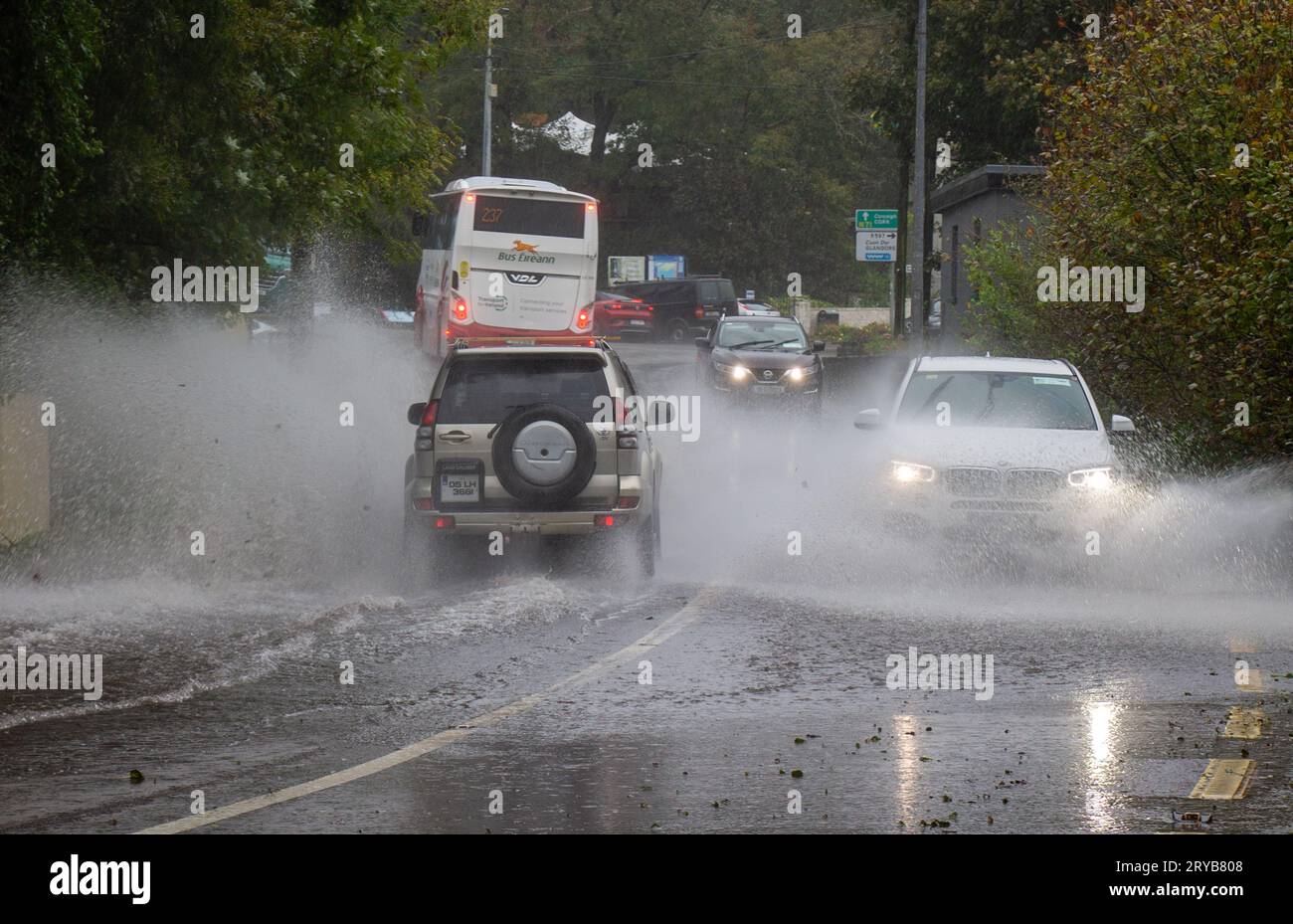 Vehicles driving through flooded roads after heavy rain Winter Storm ...