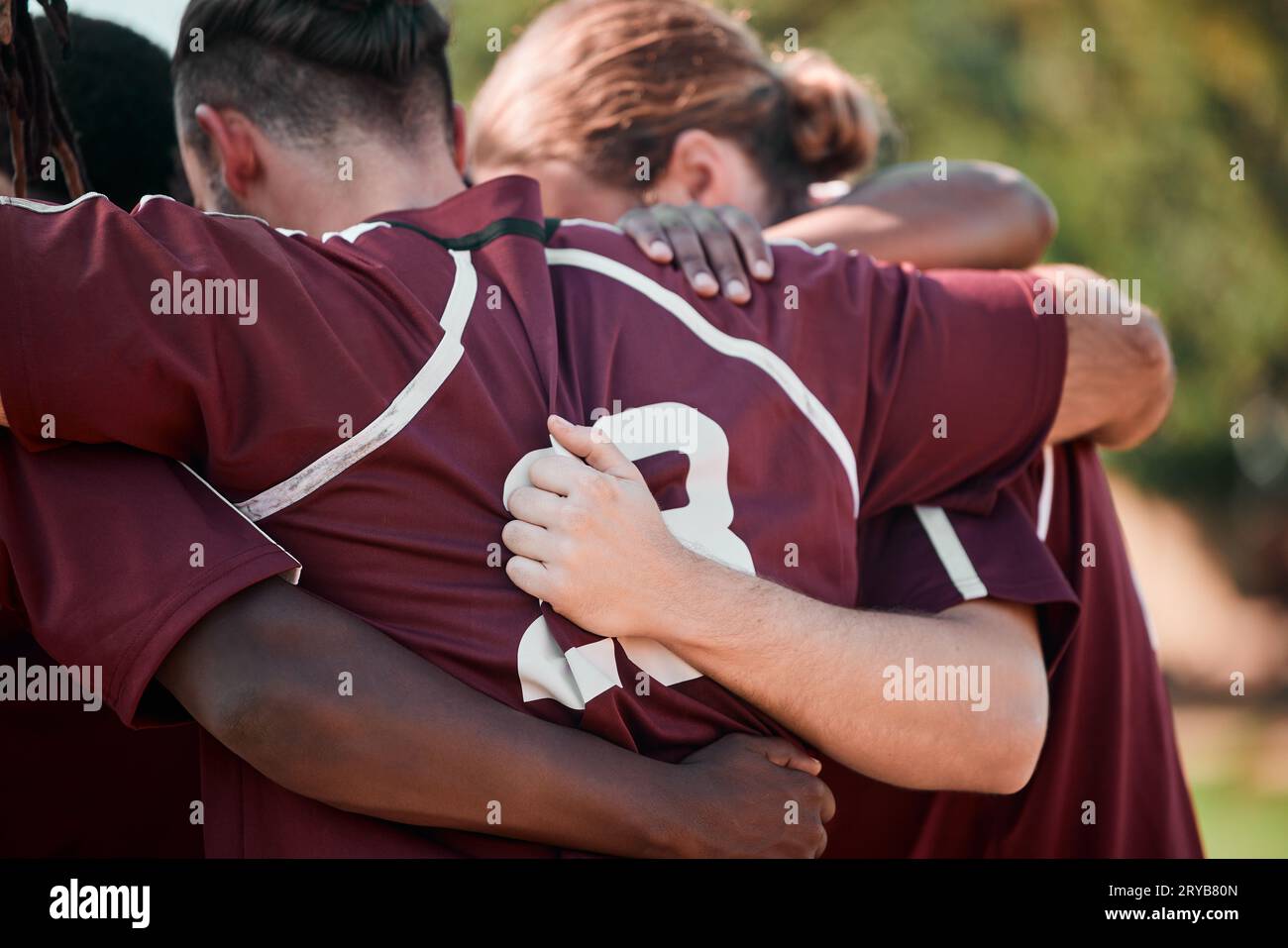 Football team, hug and fitness with sports on field, prayer and ...