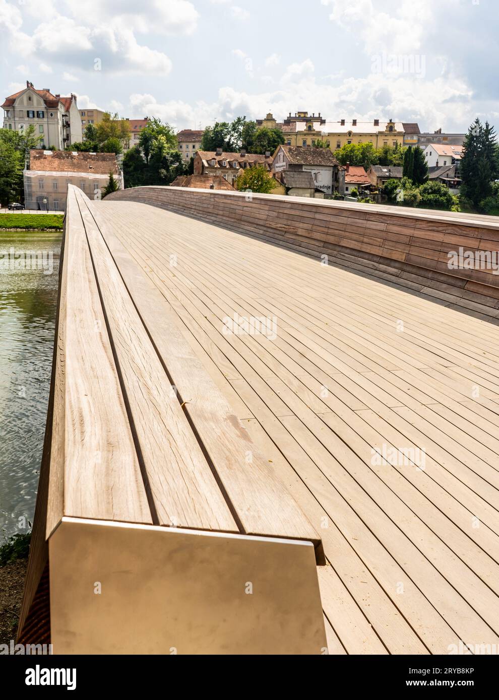Wooden bridge design, over the river Stock Photo - Alamy