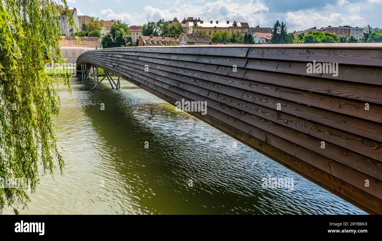 Wooden bridge design, over the river Stock Photo - Alamy