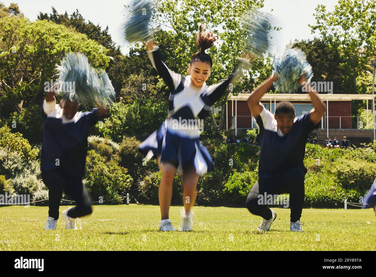 Cheerleader, dancing on field and college in happiness with energy in ...
