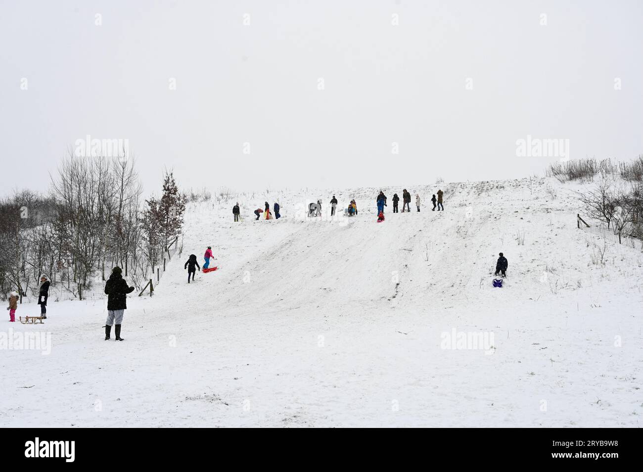 Sliding down snow slope hi-res stock photography and images - Alamy