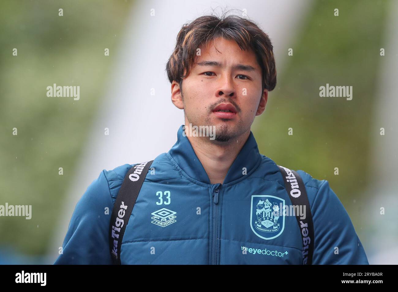 Yuta Nakayama #33 of Huddersfield Town arrives ahead of the Sky Bet Championship match ...