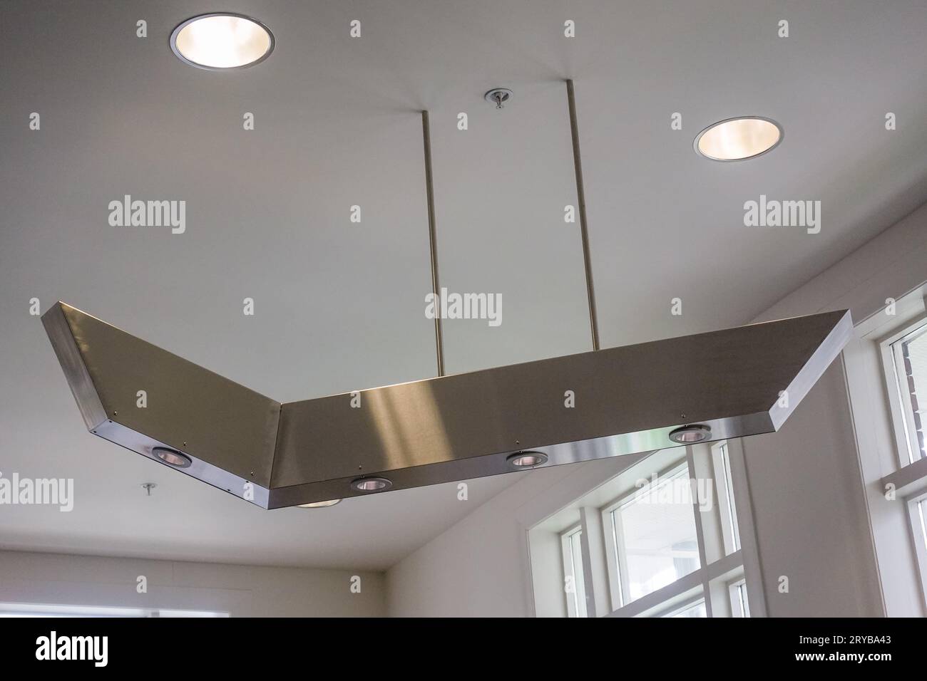 metal hockey stick shape light fixture Stock Photo - Alamy