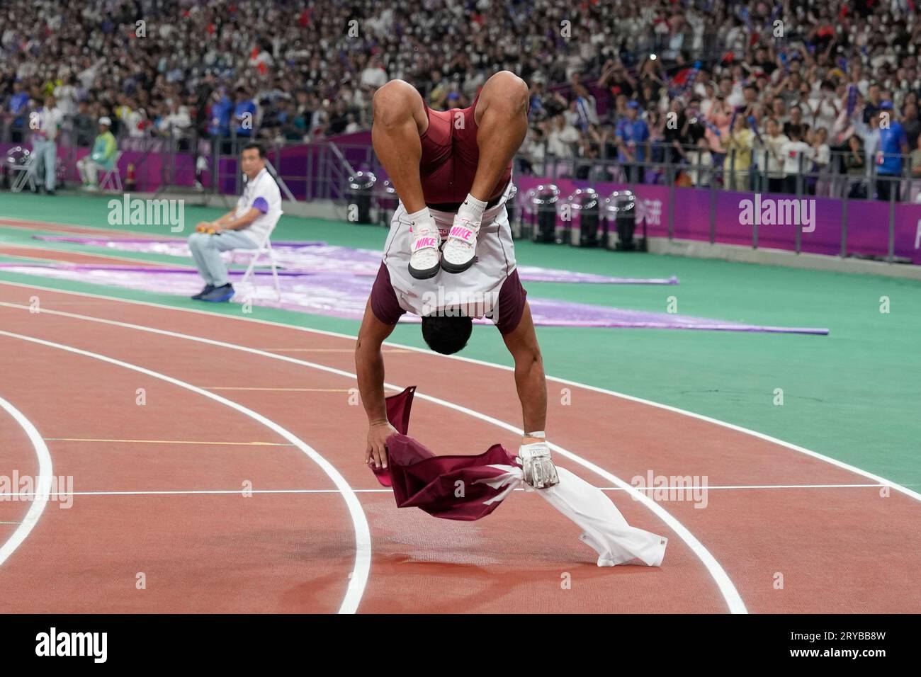 Qatar's Ashraf Elseify celebrates after winning silver medal in the men ...