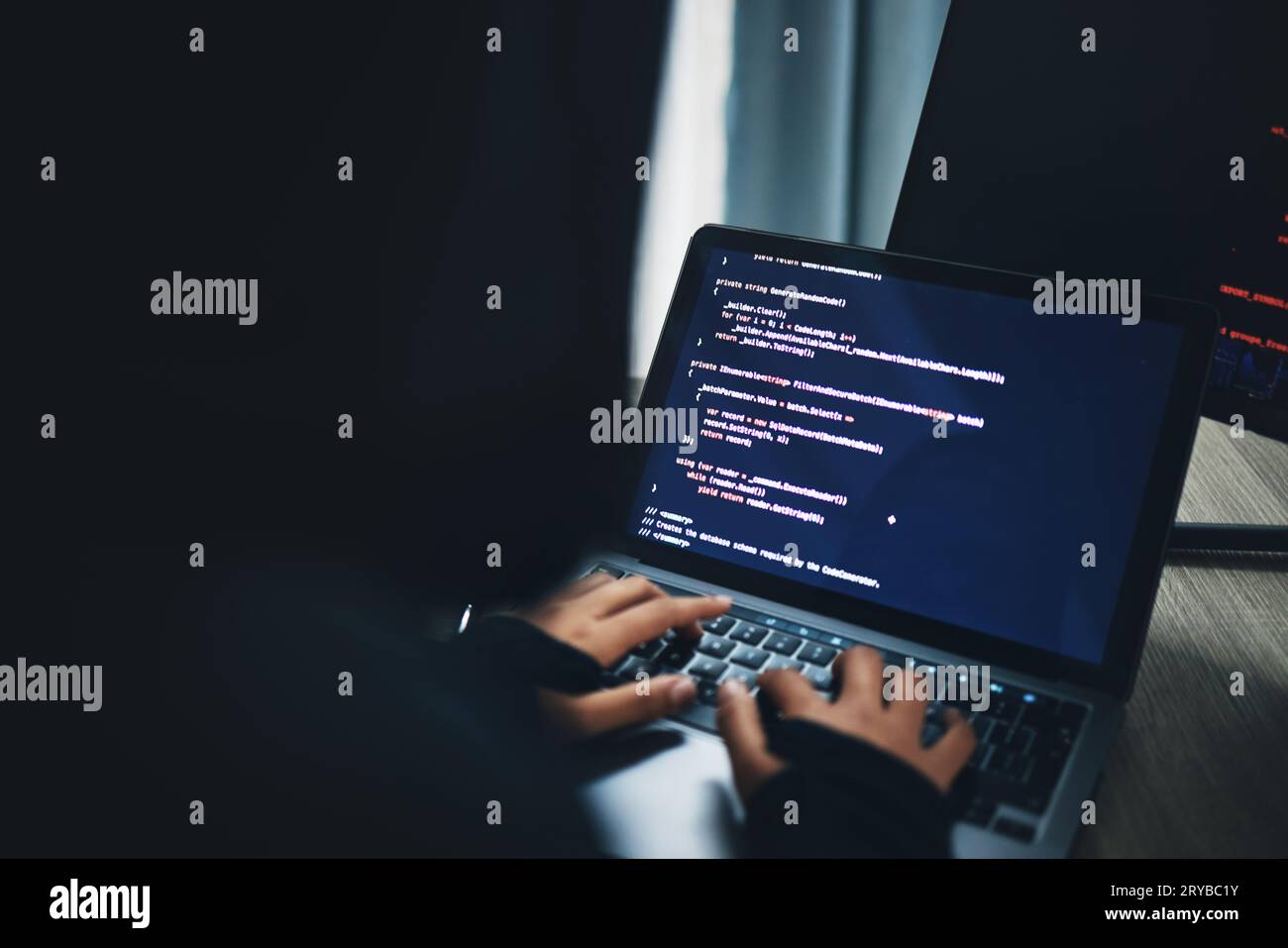 Hacker typing on futuristic computer hi-res stock photography and ...