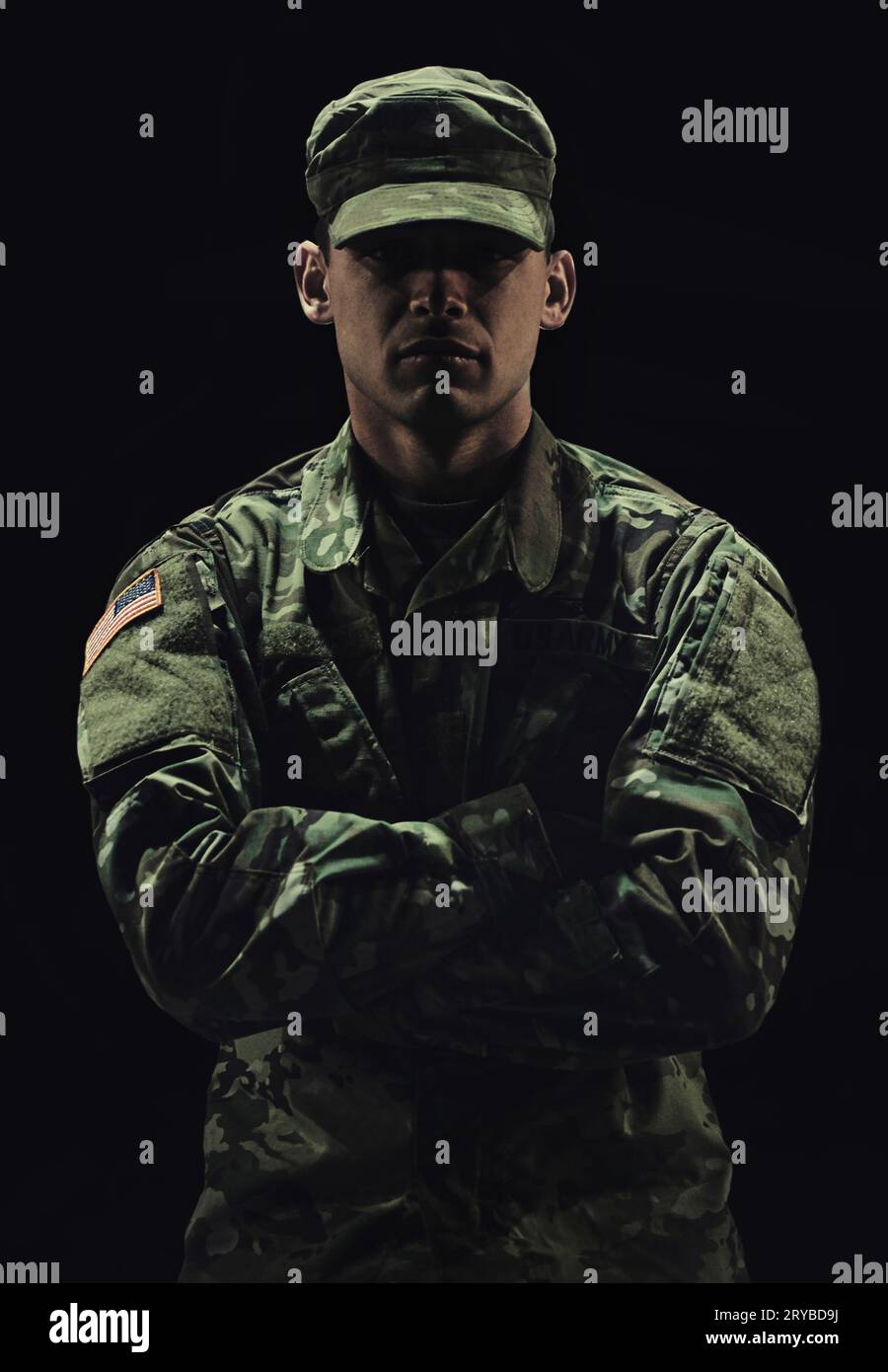 Soldier, man with arms crossed and army warrior in war, conflict and ...