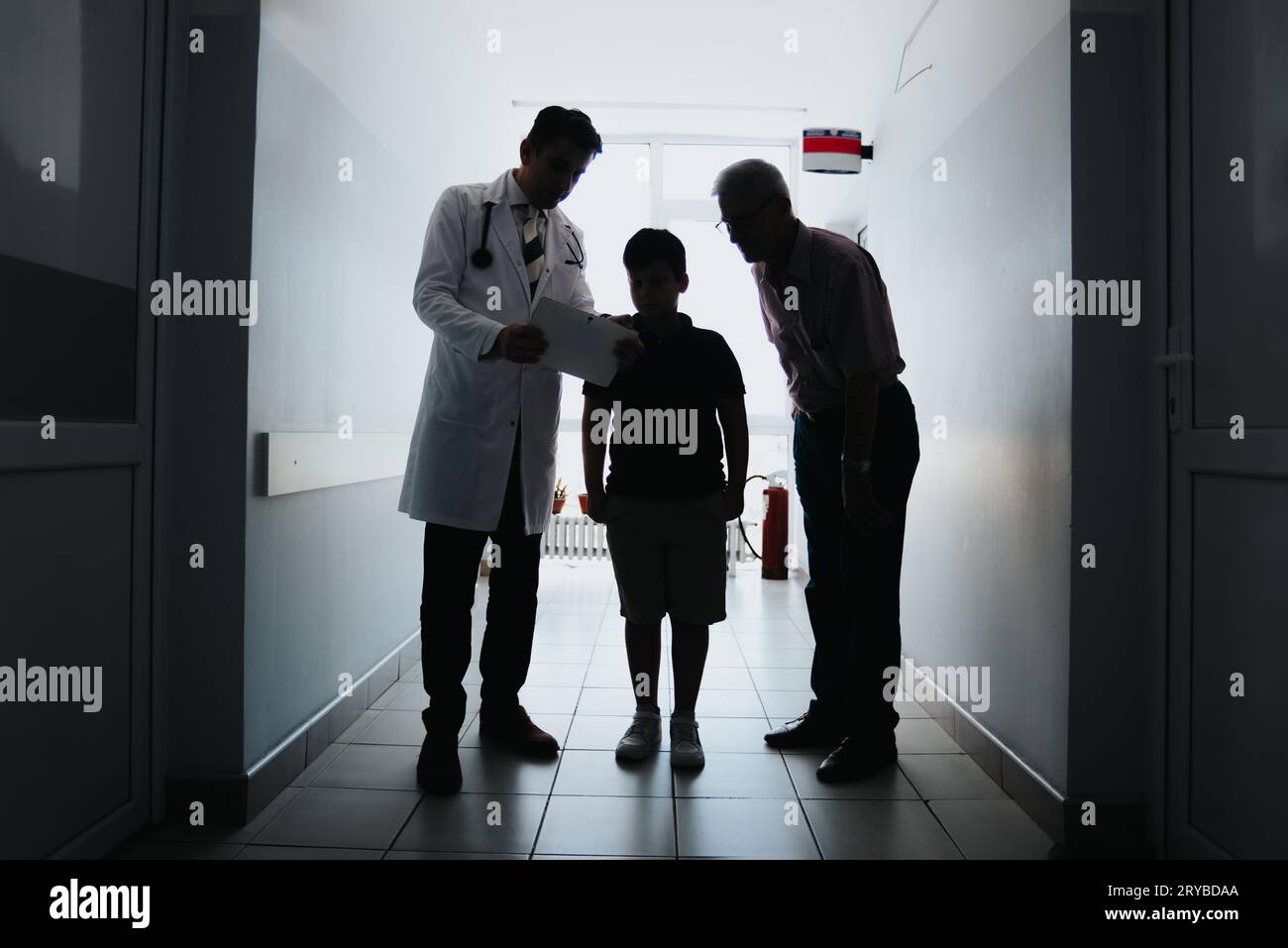 Doctor advising child hi-res stock photography and images - Alamy