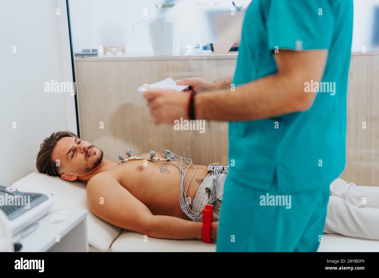 Experienced Cardiologist Consulting Patient on Heart Health and ...