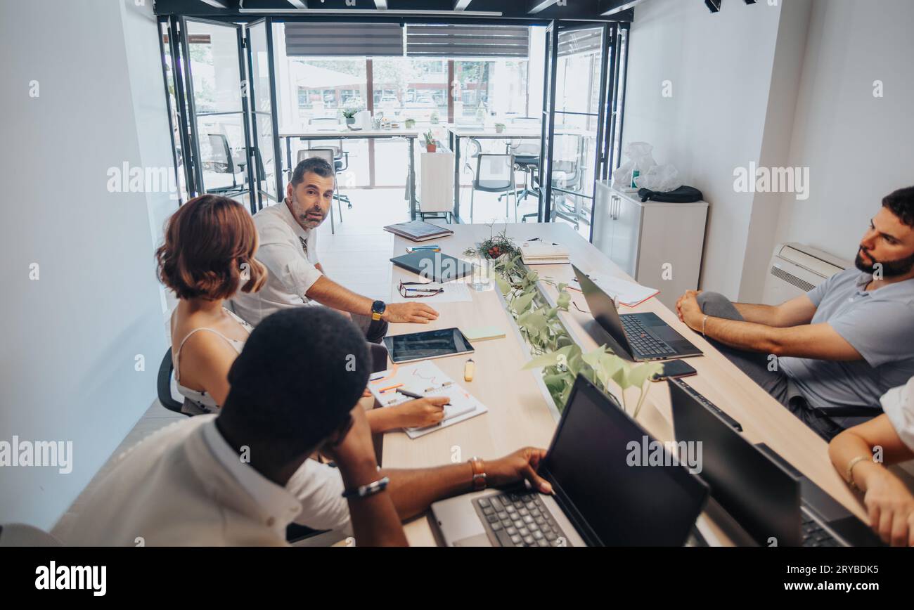 Business Partners Engaged in Productive Meeting for Profit Growth and ...