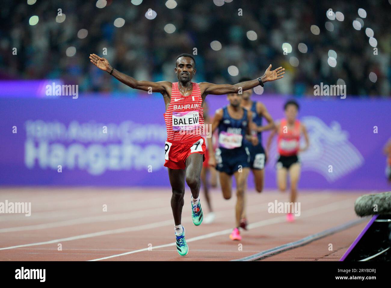 Bahrain's Birhanu Yemataw Balew crosses the finish line to win the men ...