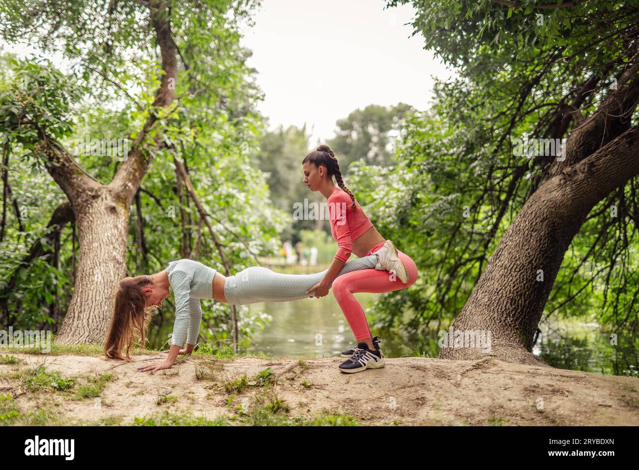 Active Friends Enjoying Outdoor Workout in Urban Park Stock Photo - Alamy