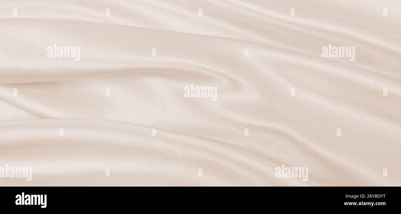 Smooth elegant golden silk or satin luxury cloth texture can use as ...
