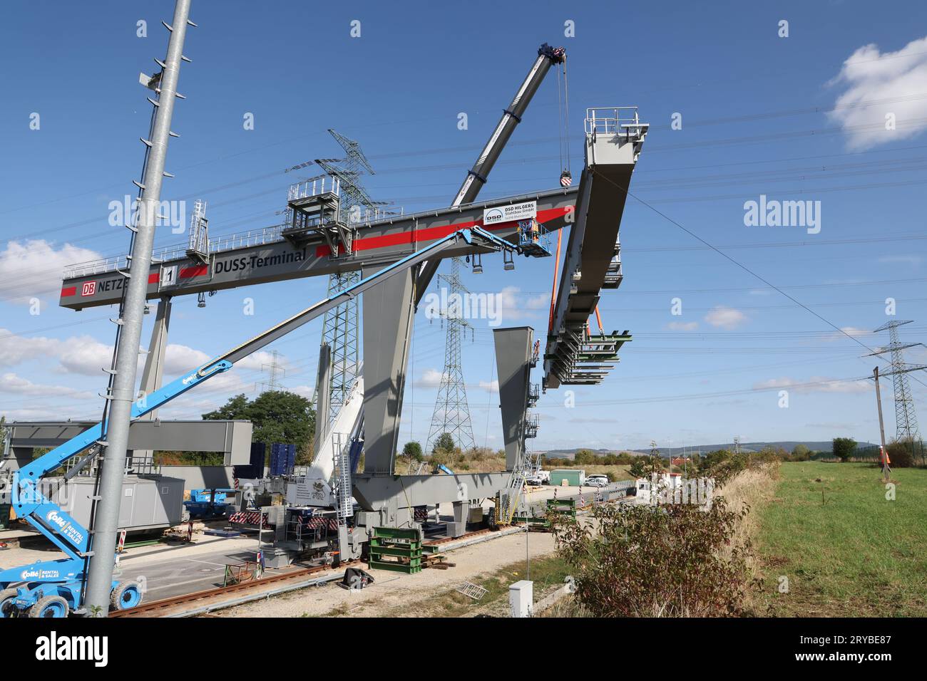 Erfurt, Germany. 30th Sep, 2023. Workers from a crane company used a ...