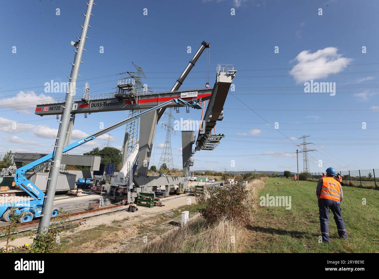 Erfurt, Germany. 30th Sep, 2023. Workers from a crane company used a ...