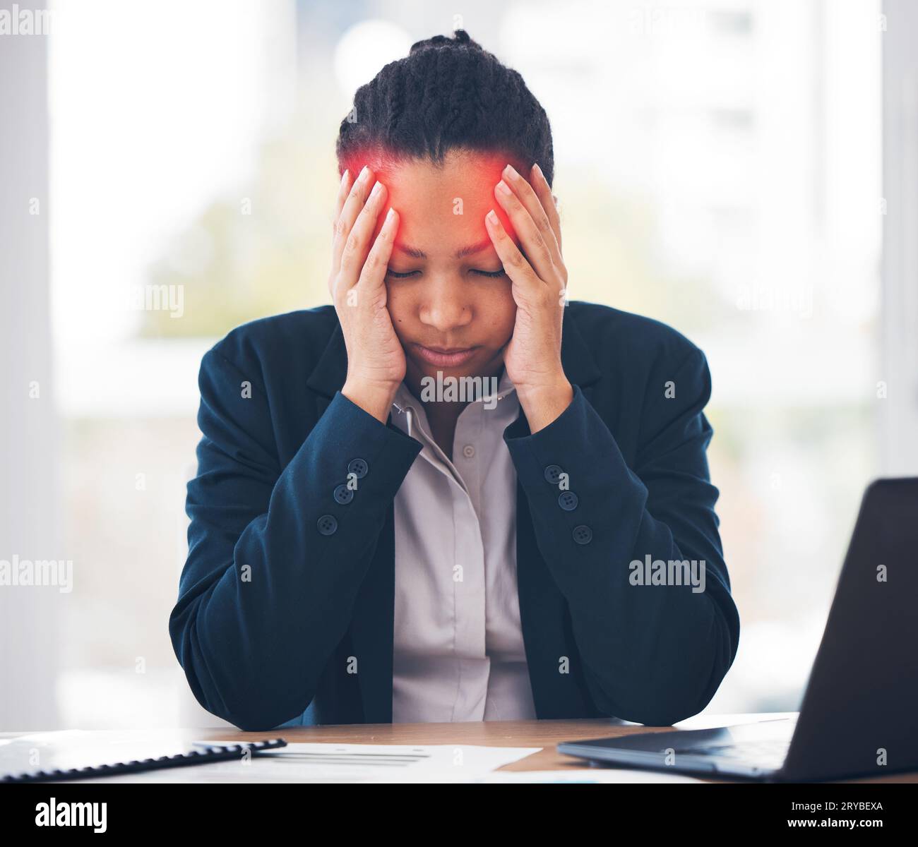 Stress, headache and business woman in office with laptop, documents or ...