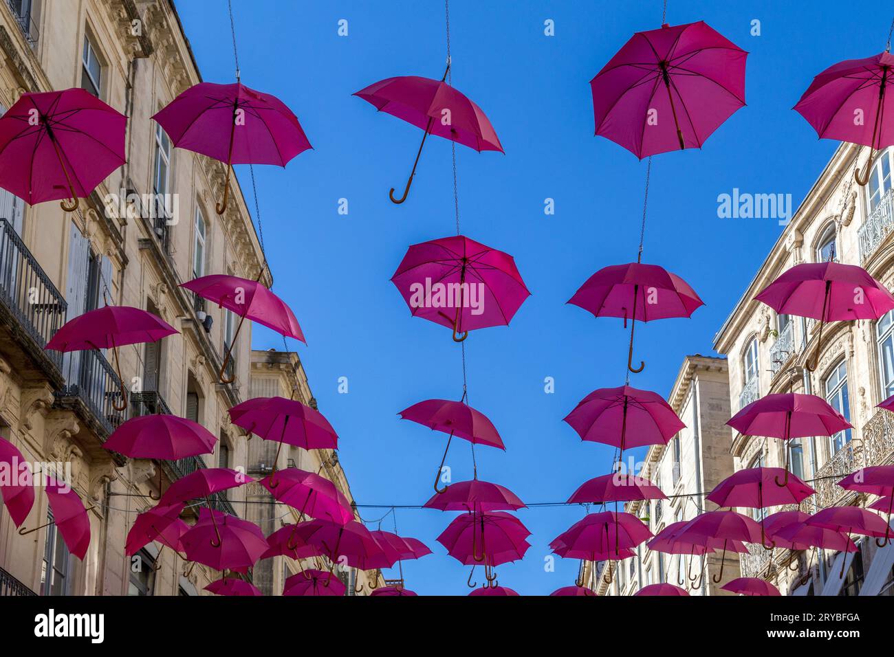 Pink umbrellas hung in the rue de La Loge as part of Pink October, a ...