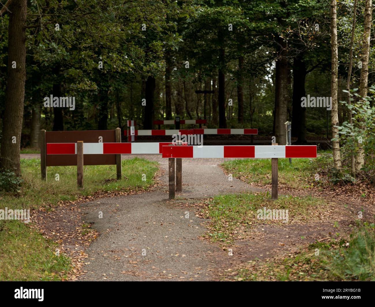 red and white painted planks as a finishing touch to a cycle path in ...