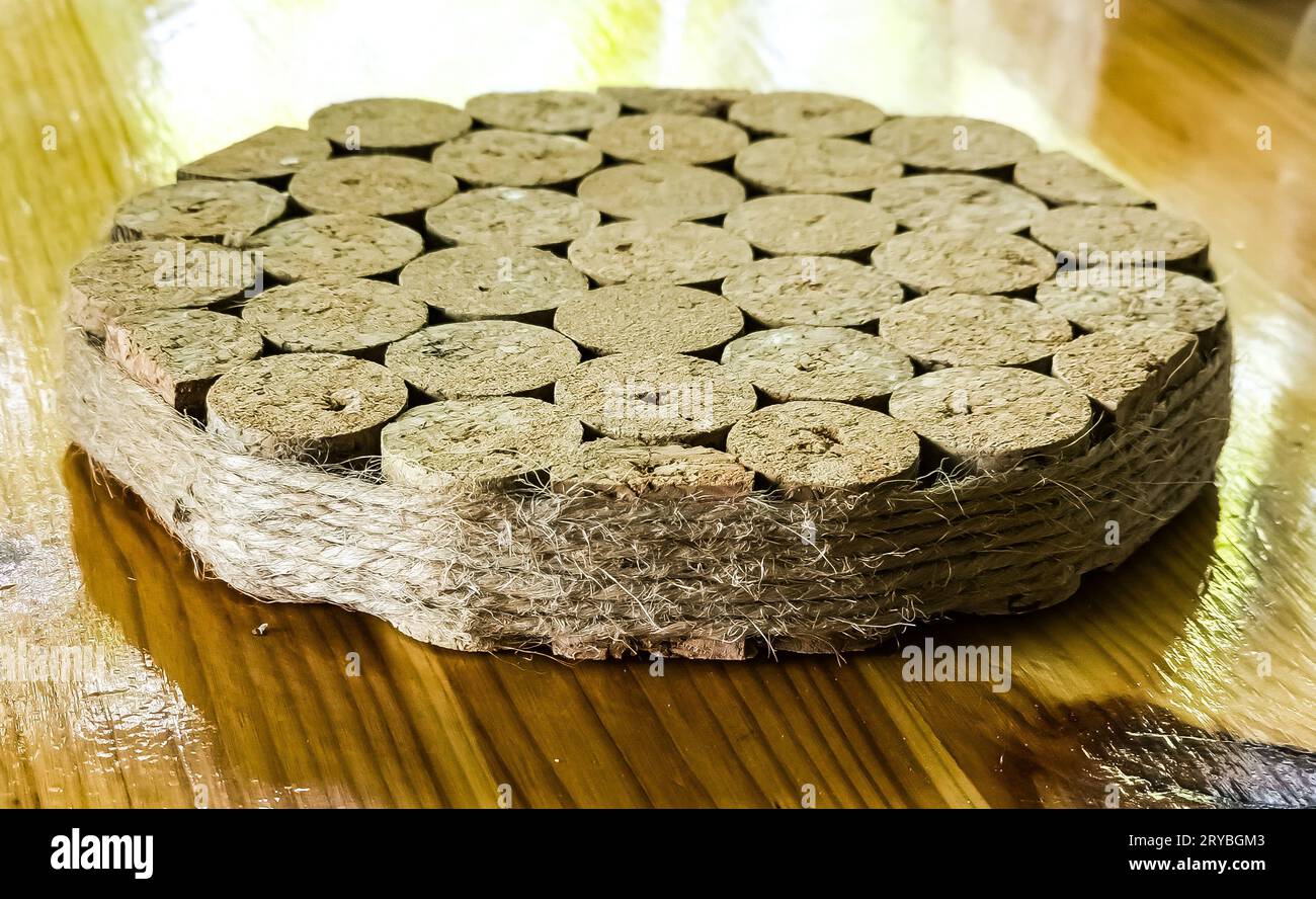 A stand for hot objects made from wine corks. Kitchen items Stock Photo ...