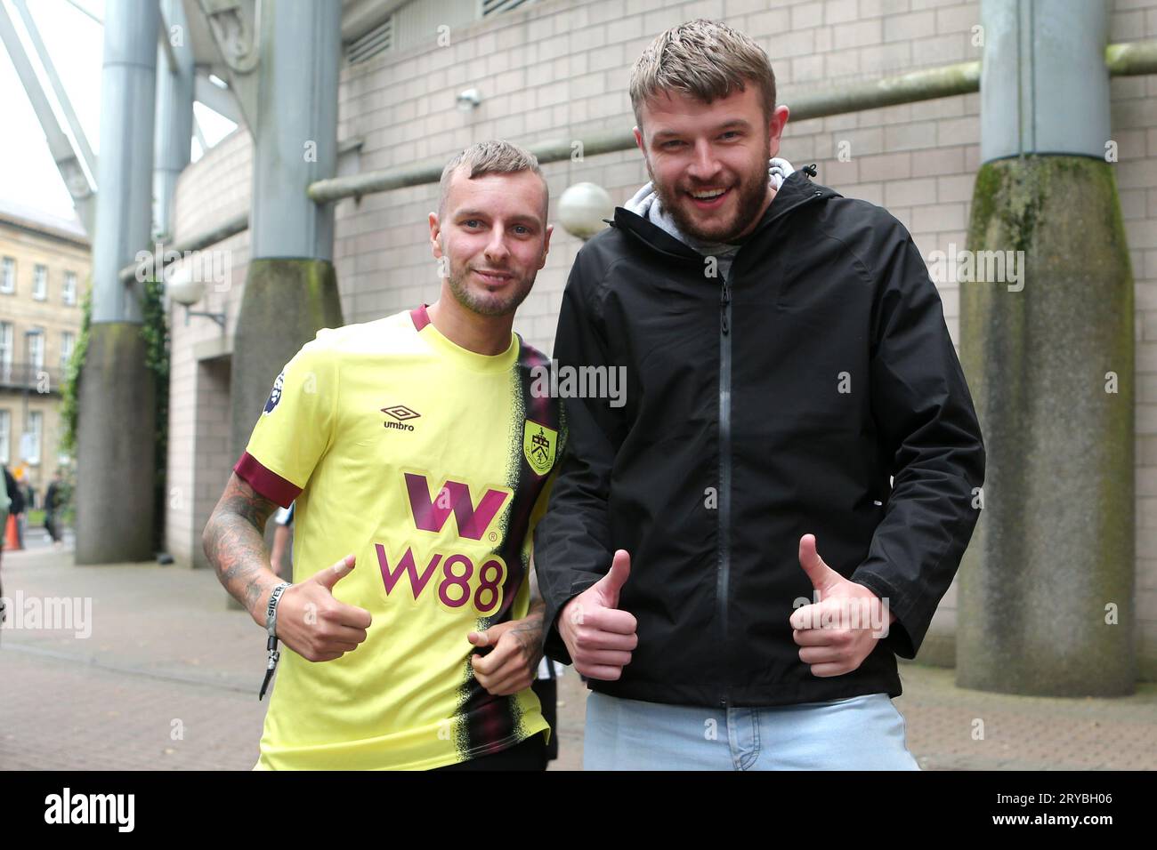 Burnley fans pose for photographs outside the stadium before the ...
