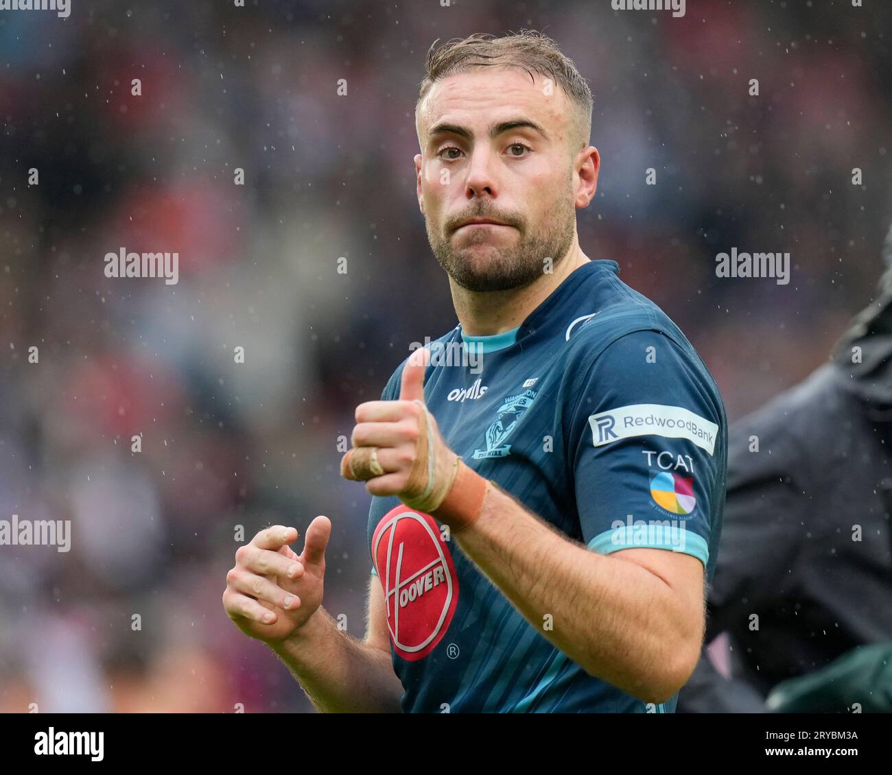James Harrison #8 of Warrington Wolves salutes the fans after the ...