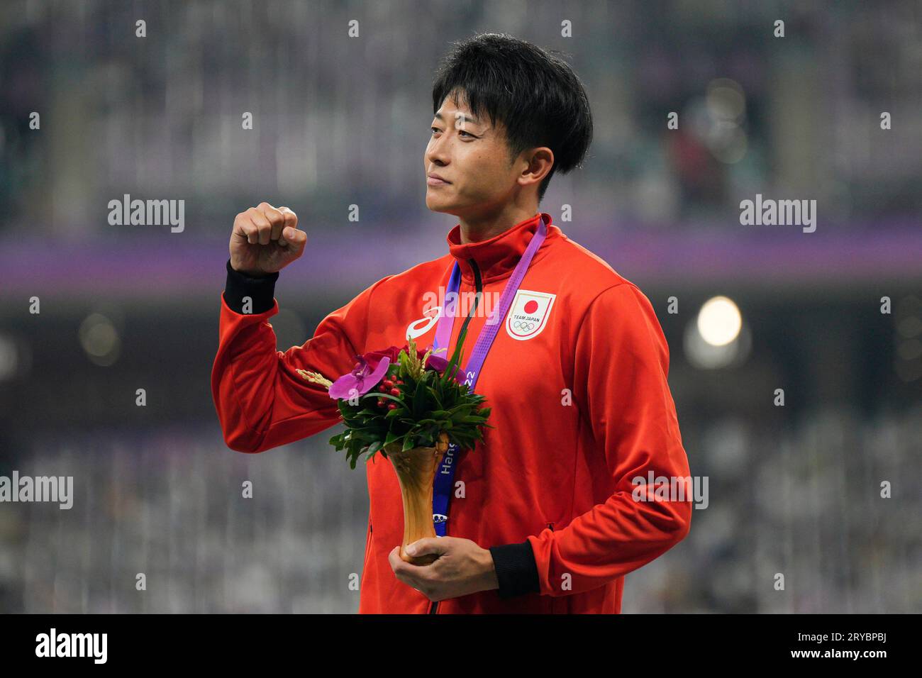 Silver medalist Japan's Kentaro Sato celebrates on the podium during ...