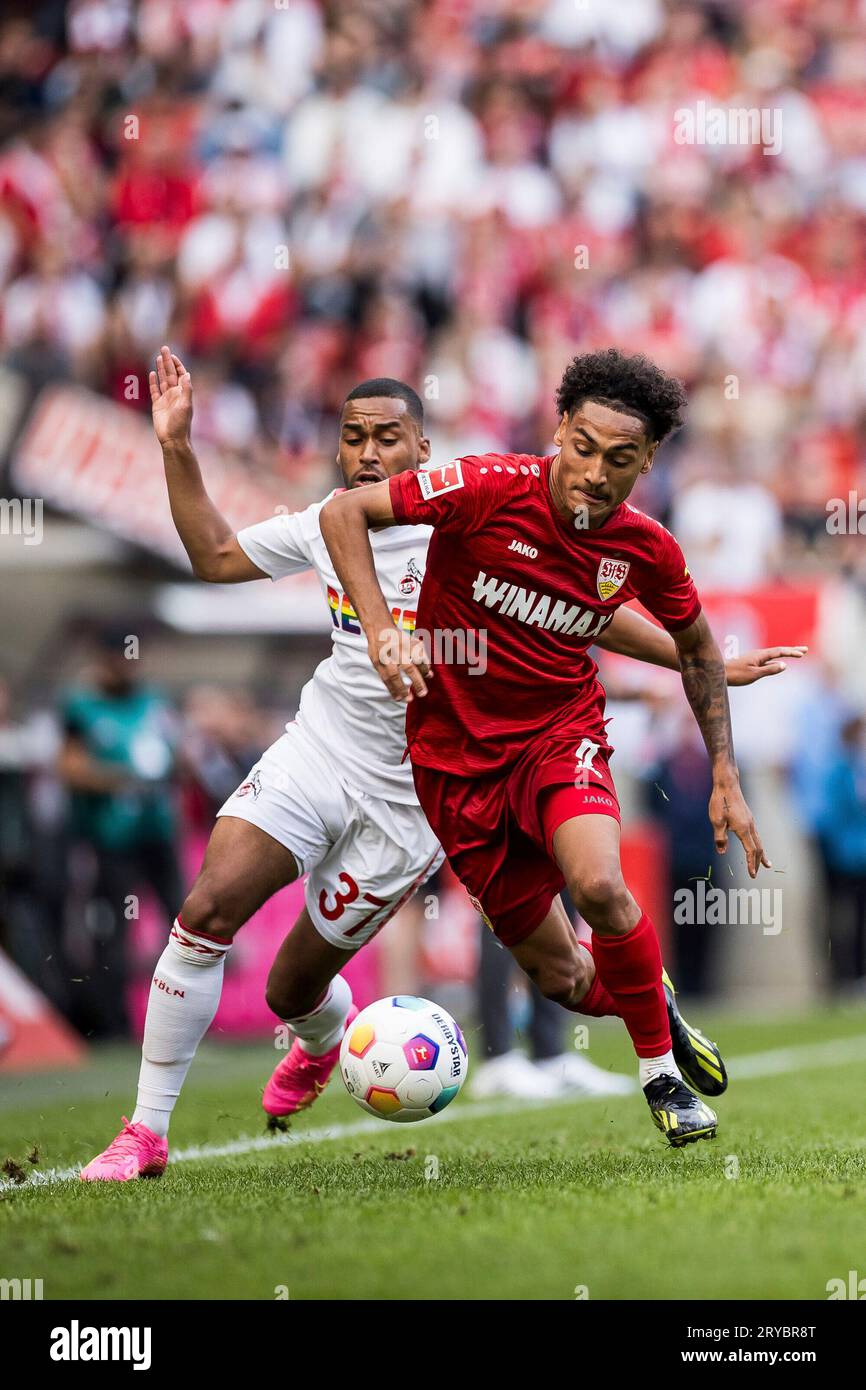 Koeln, Deutschland. 30th Sep, 2023. Zweikampf Linton Maina (1. FC Koeln, #37), Enzo Millot (VfB ...