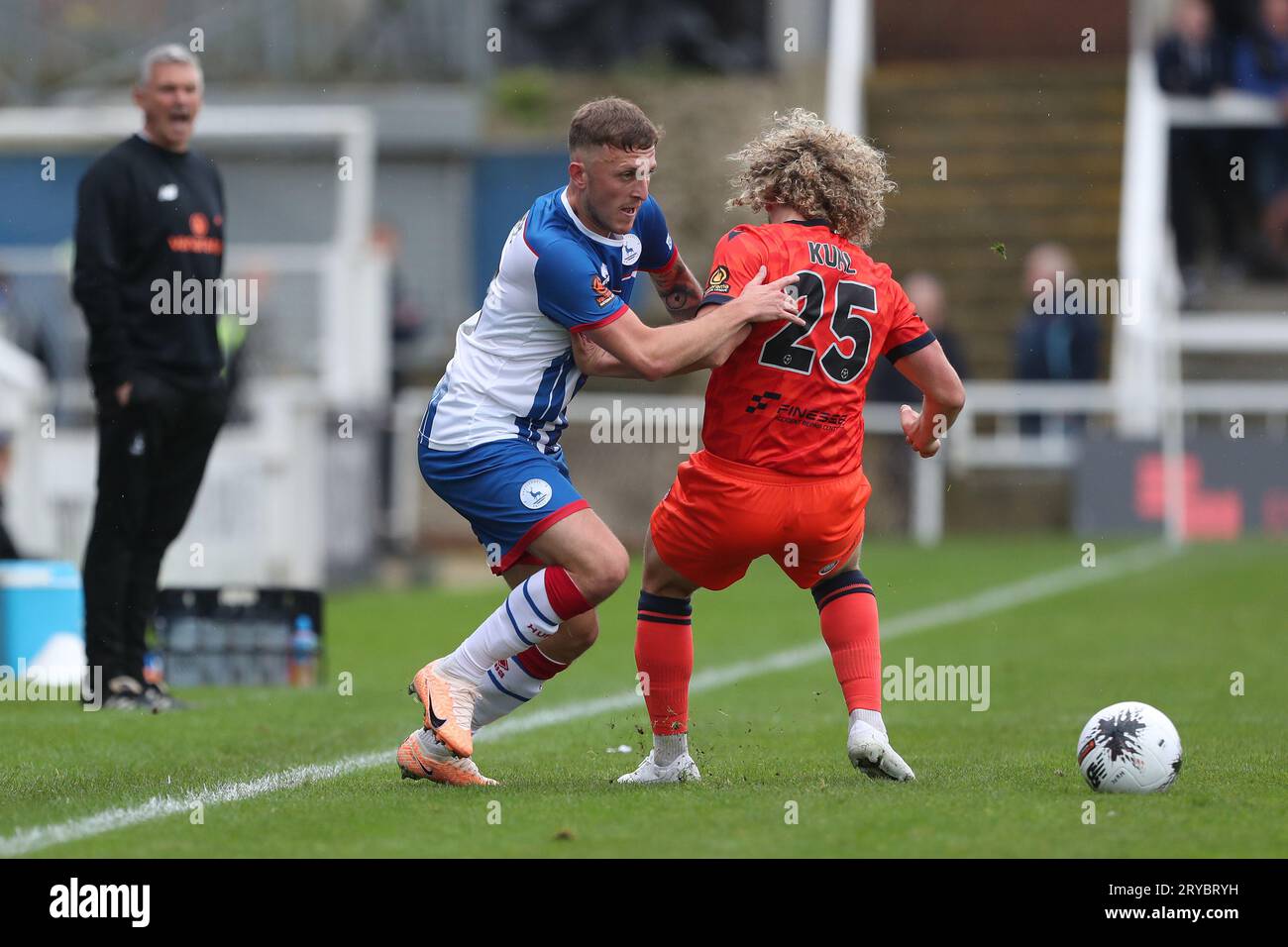 Oliver Finney of Hartlepool United battles with Dorking Wanderers ...