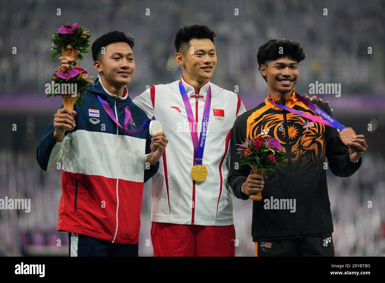 Medalists, from left to right, Thailand's Puripol Boonson, silver ...