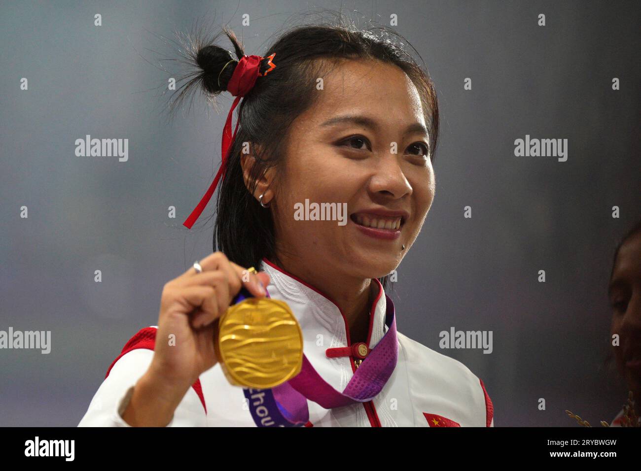 Gold medalist China's Ge Manqi celebrates on the podium during the ...