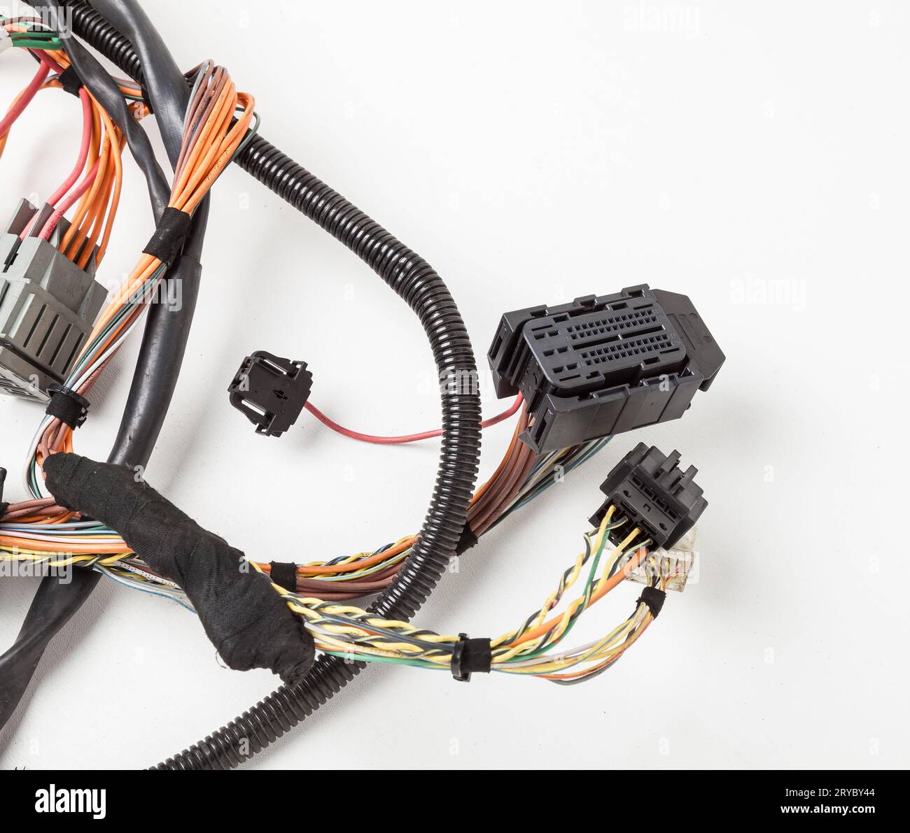 A cable of matted wires of different colors with connectors in the ...