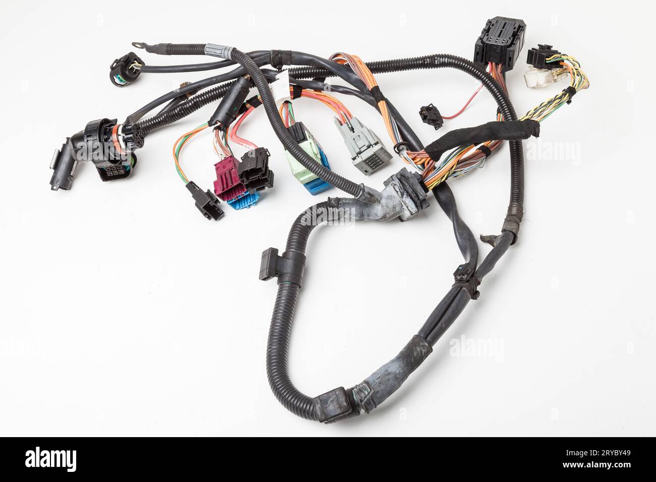 A cable of matted wires of different colors with connectors in the ...