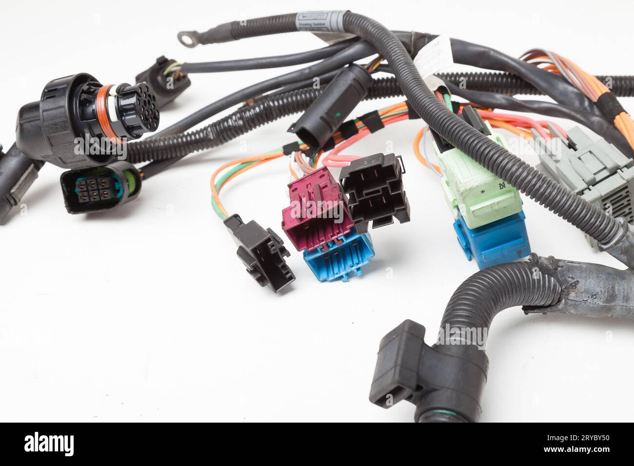 A cable of matted wires of different colors with connectors in the ...