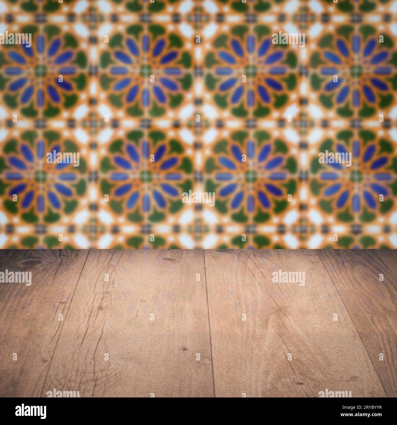 Wood table top and blur vintage ceramic tile pattern wall Stock Photo ...