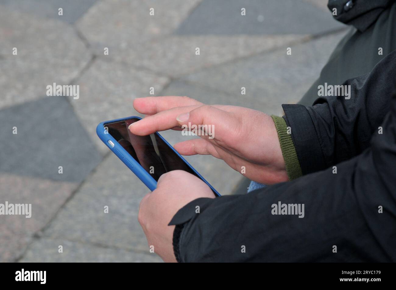 30 September. 2023/. Person using cellphone iphnne of smart phone in ...