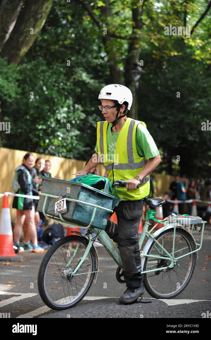 A cyclist, wearing a ‘Fred Flintstone’ style top, straining during the ...