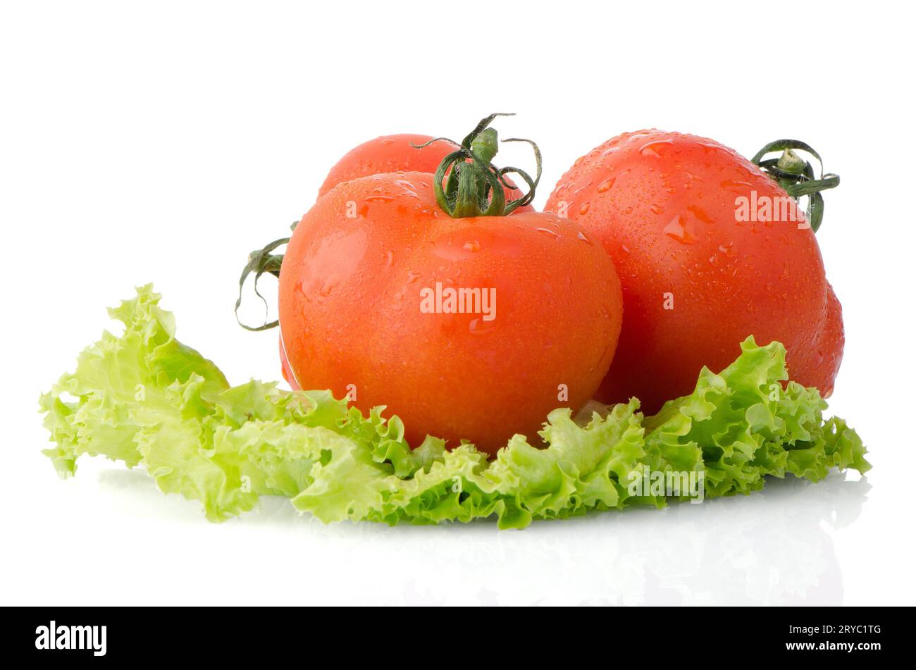 Two clean red tomatoes Cut Out Stock Images & Pictures - Alamy