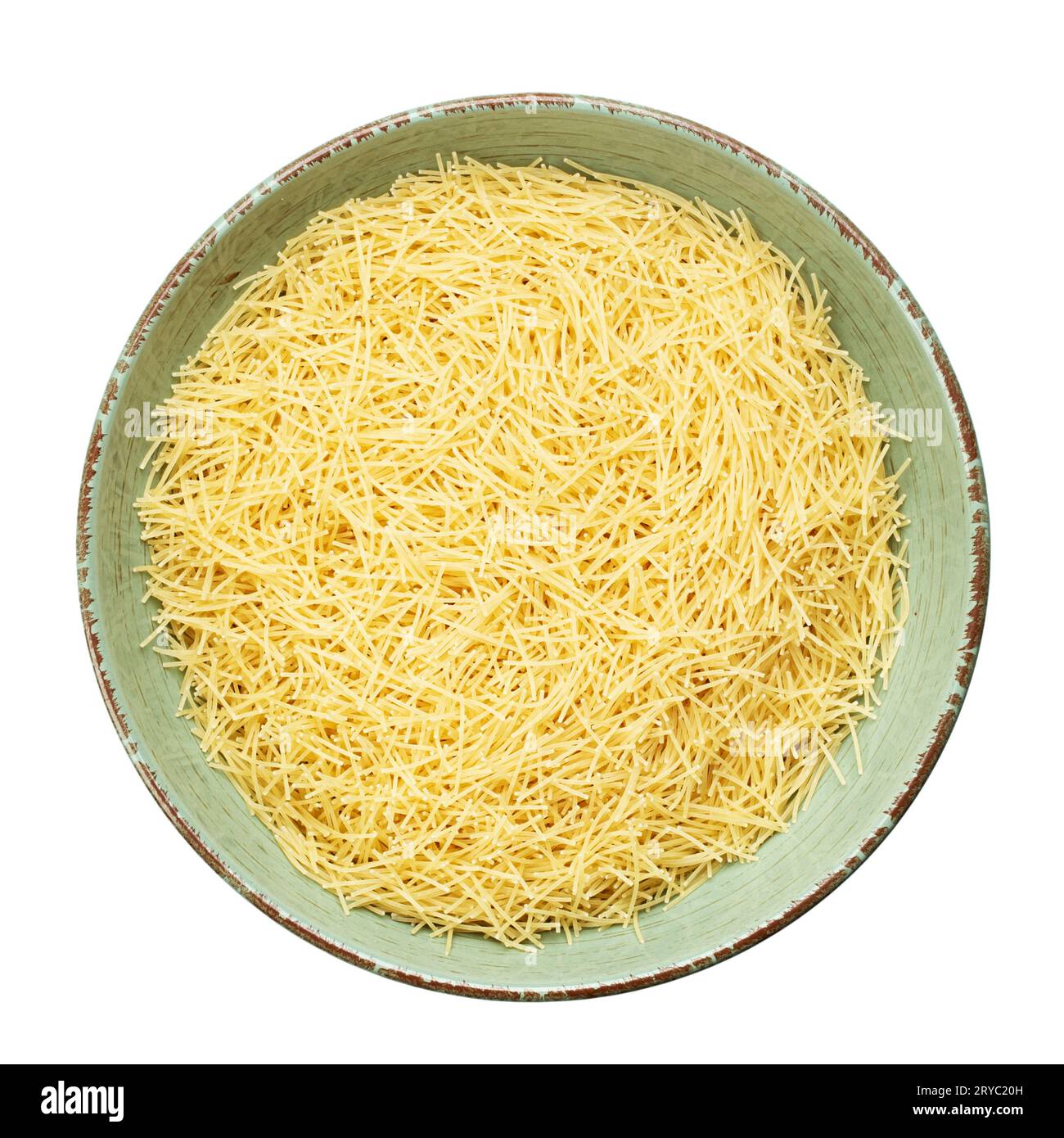 Filini raw pasta in clay bowl isolated on white background. File ...