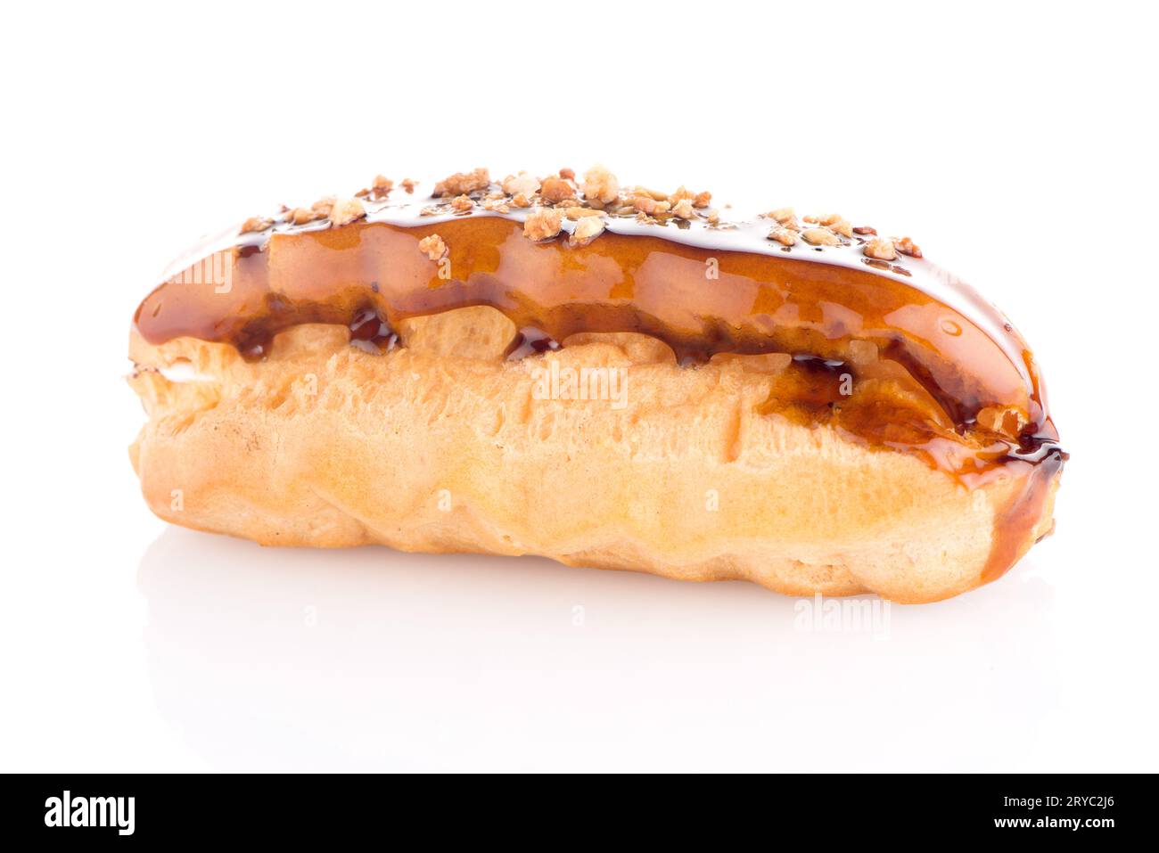 Eclair with caramel decoration Stock Photo - Alamy