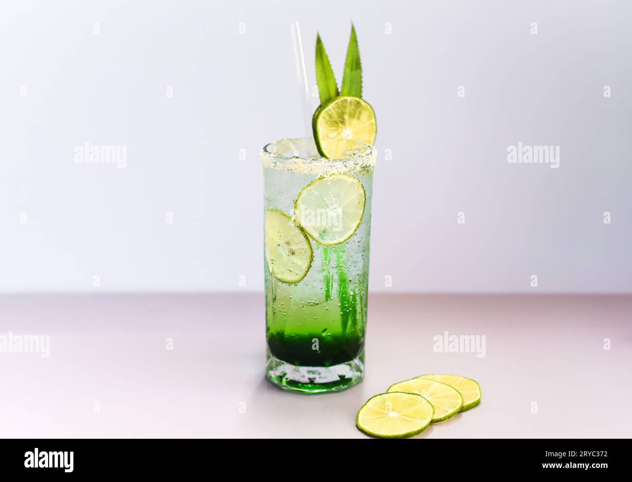 Panda leaves lemonade with desiccated coconut and green syrup on light ...