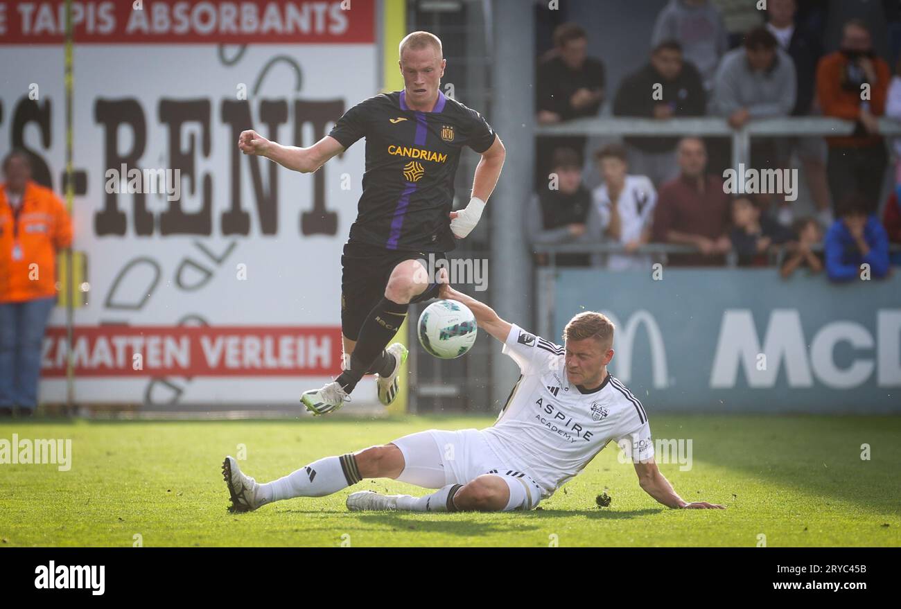 Eupen, Belgium. 30th Sep, 2023. Anderlecht's Louis Patris and Eupen's ...