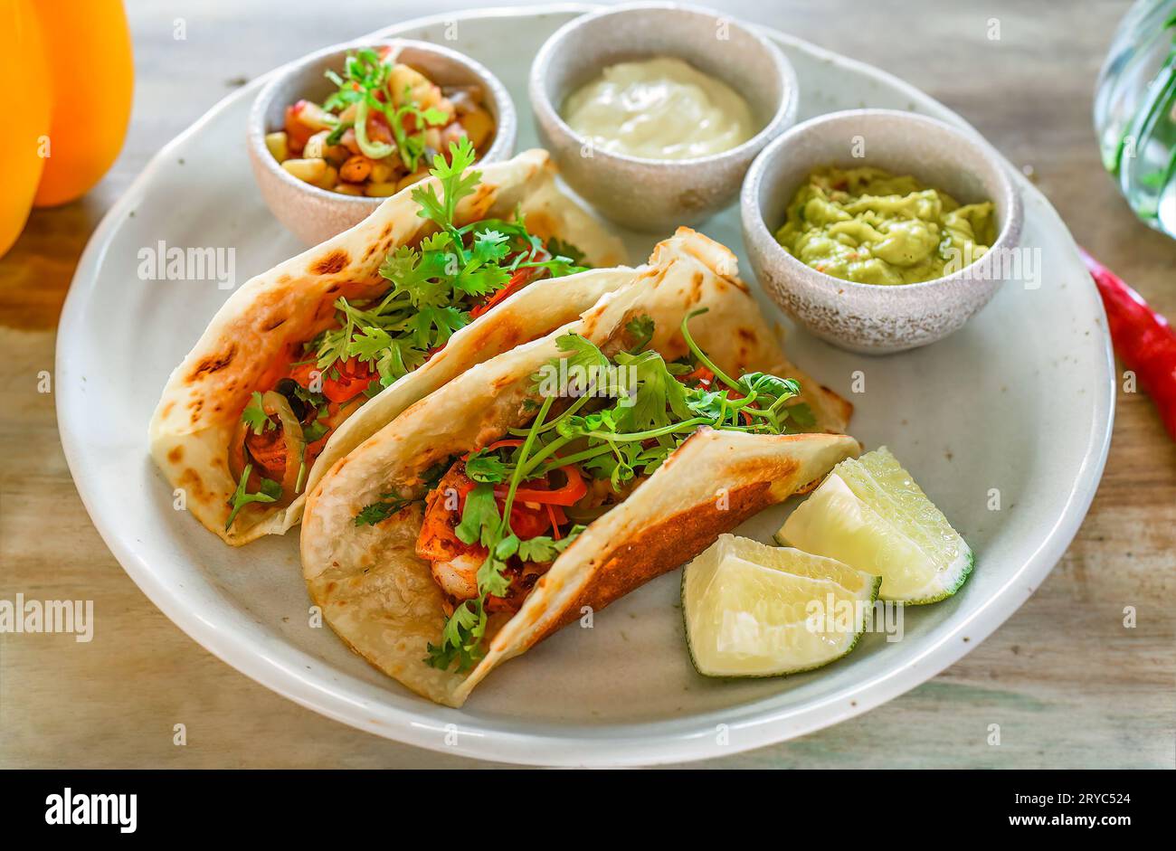 Burnt cheese taco with shrimps, fajita spice, pico de gallo, sour cream ...