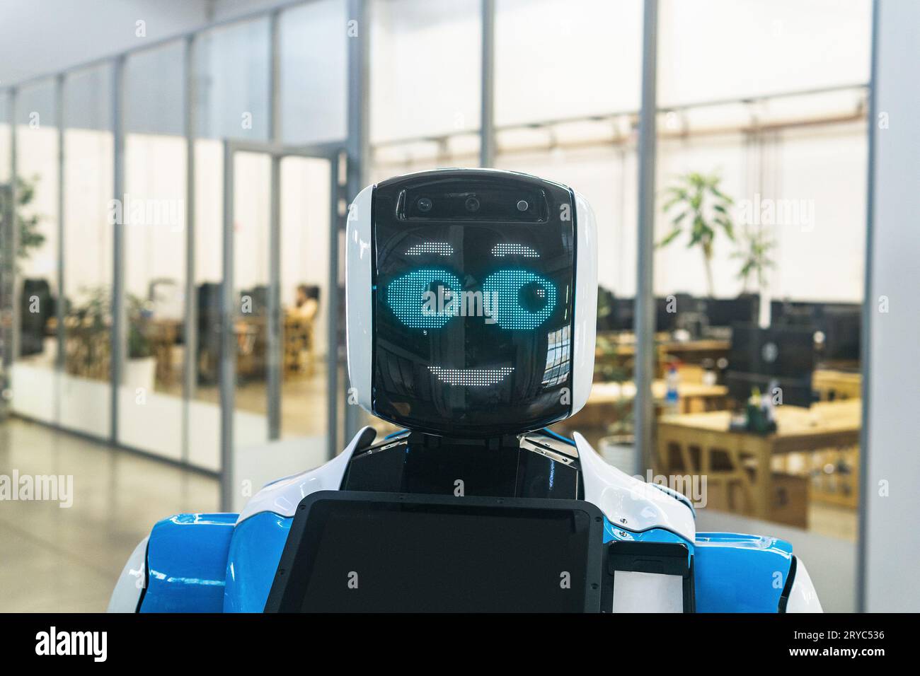 Perm, Russia - July 13, 2023: humanoid robot guide expressing emotions against the background of ...