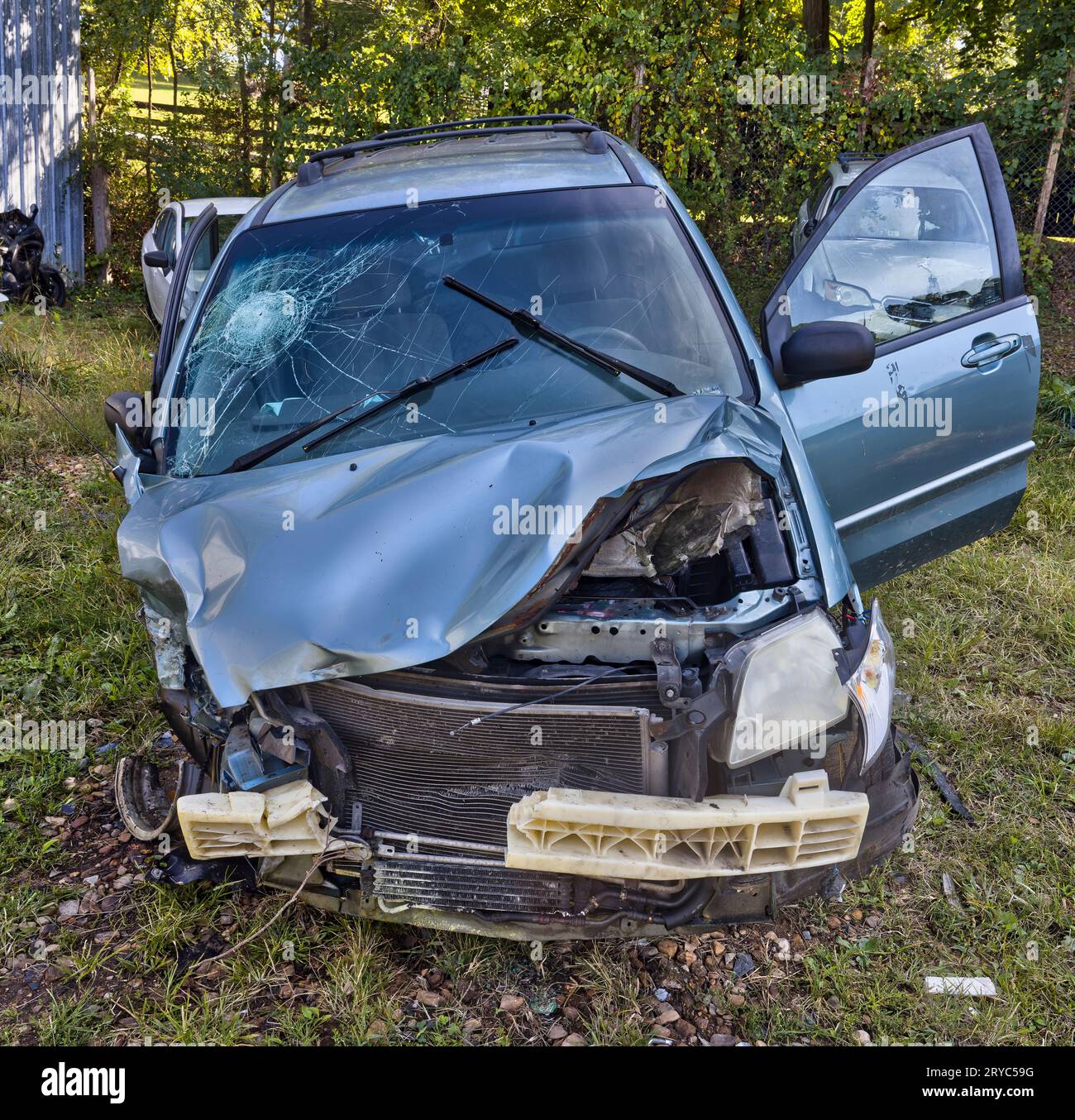 Blue van after head on collision Stock Photo - Alamy