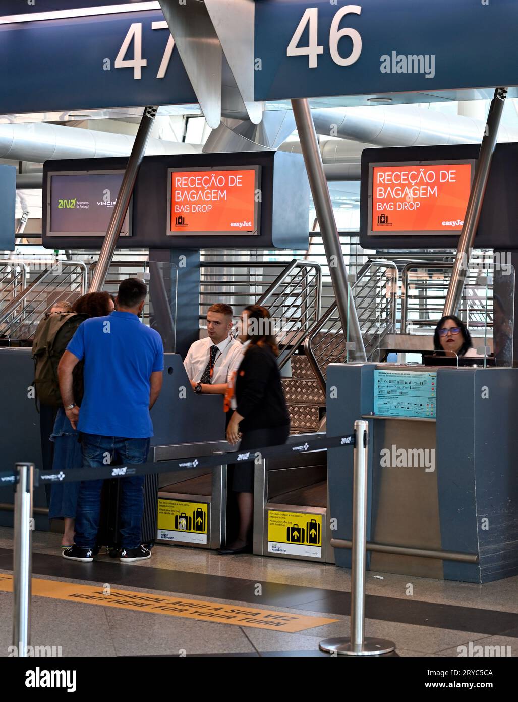Inside Porto airport ( Aeroporto Francisco Sá Carneiro) foyer with bag ...
