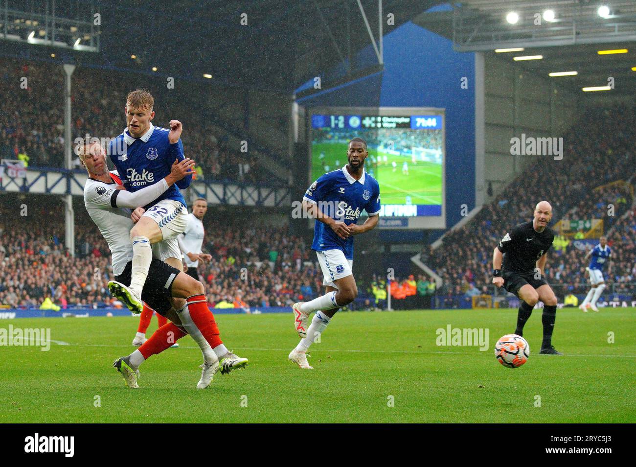 Luton Town's Mads Juel Andersen collides with Everton's Jarrad ...