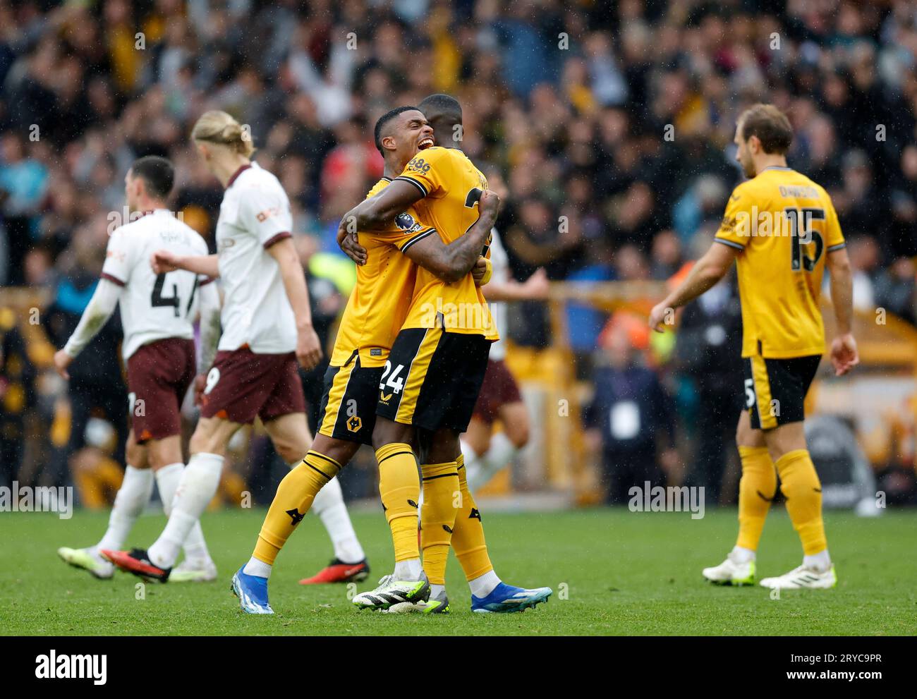 Wolverhampton Wanderers' Mario Lemina (left) and Toti Gomes celebrate ...